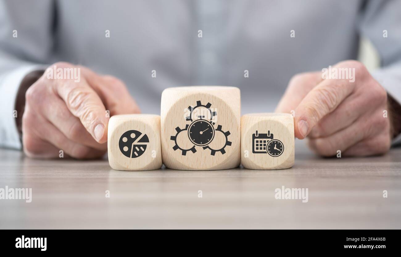 Wooden blocks with symbol of productivity concept Stock Photo - Alamy