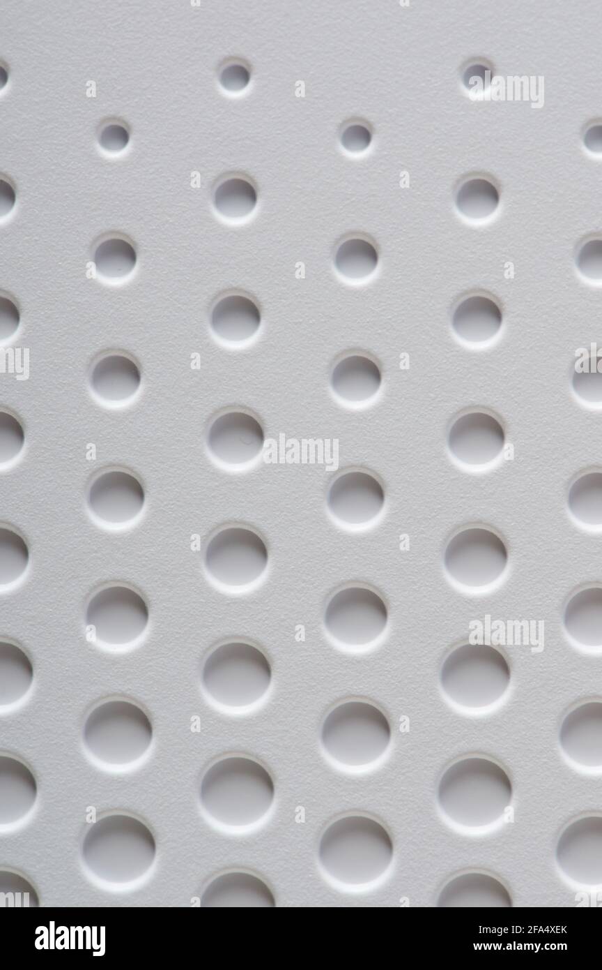 Abstract white grilled surface on plastic close up view Stock Photo - Alamy