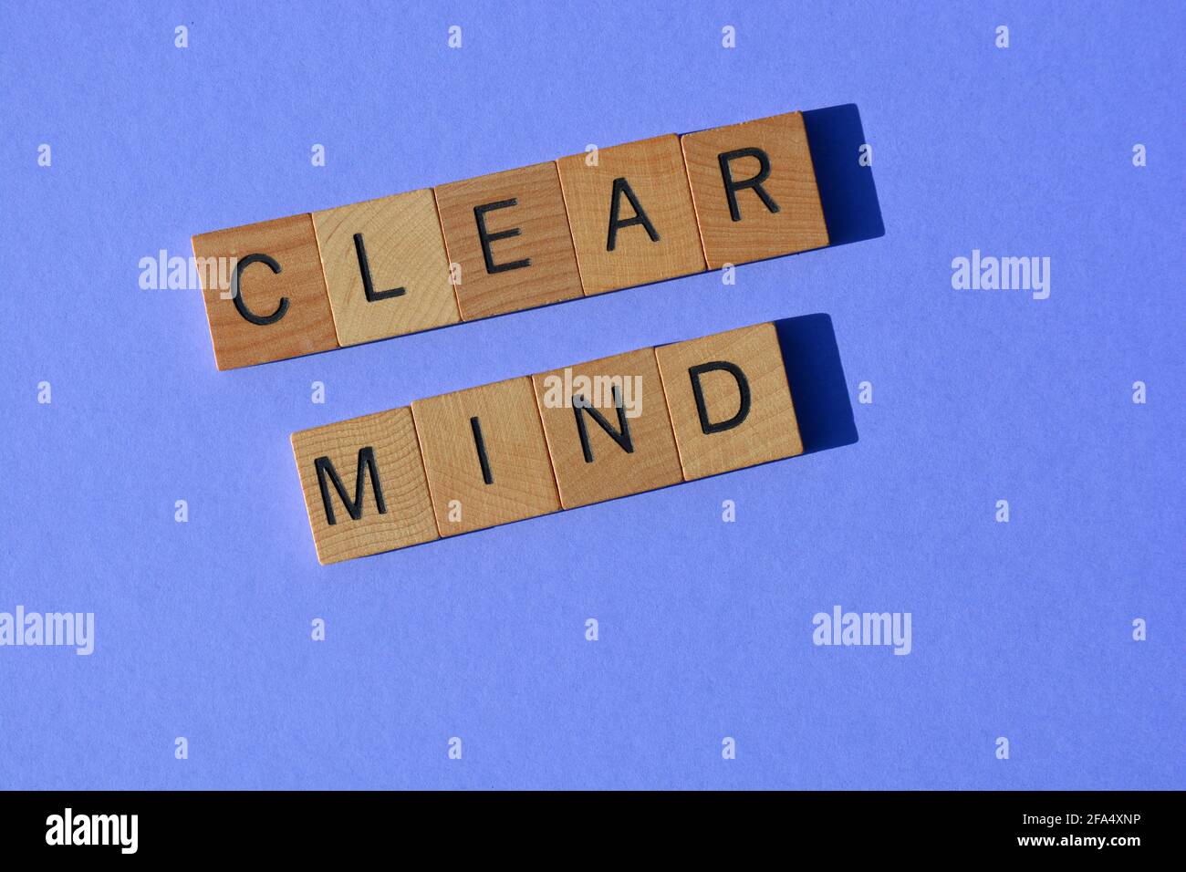 Clear Mind, words in wooden alphabet letters isolated on purple ...