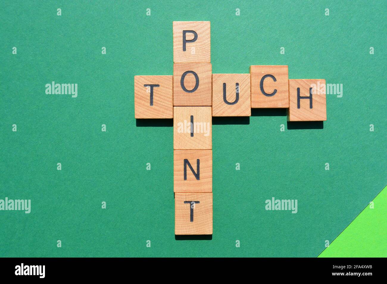 Touch Point, words in wooden alphabet letters in crossword form ...