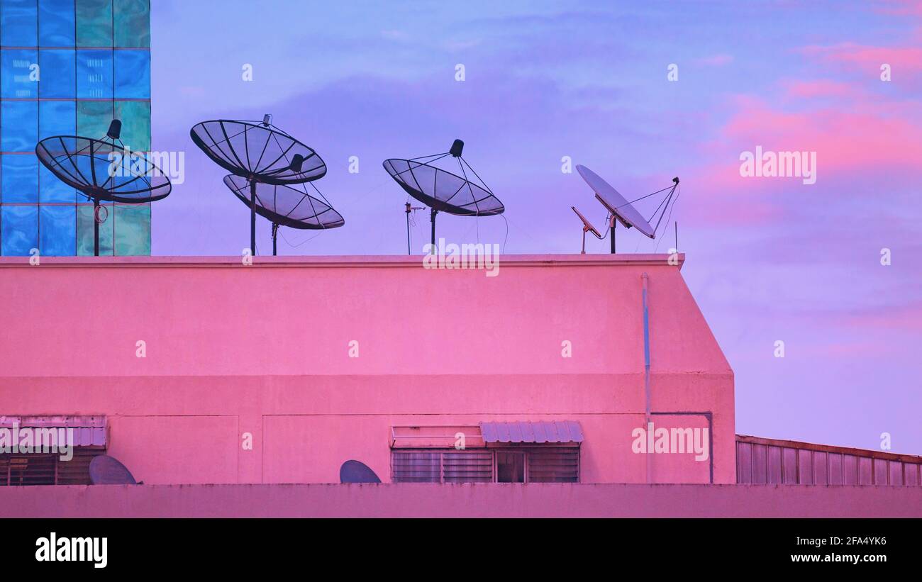 Satellite receiver on the building at the time of the twilight sky ...