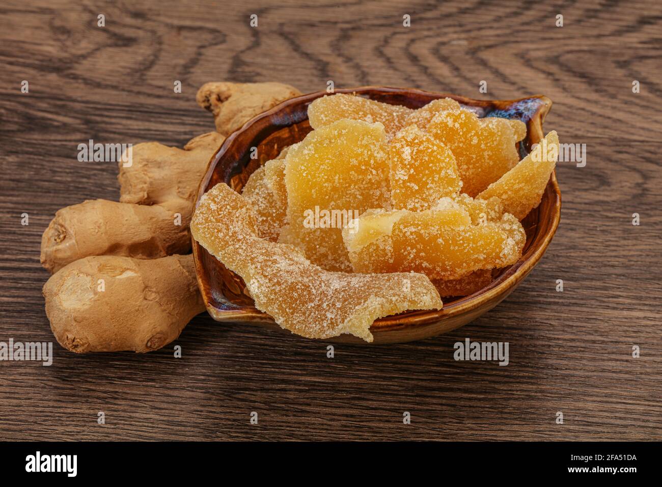 Dry sweet ginger snack in the bowl Stock Photo - Alamy