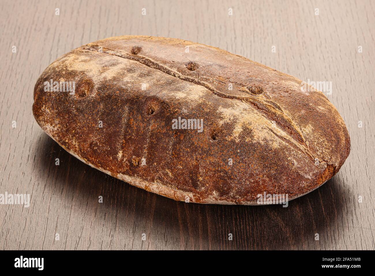 Organic Rye cereal crust bread over board Stock Photo - Alamy