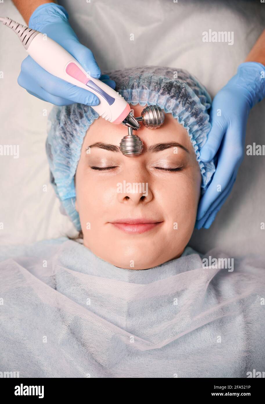 Microcurrent face therapy young hi-res stock photography and images - Alamy
