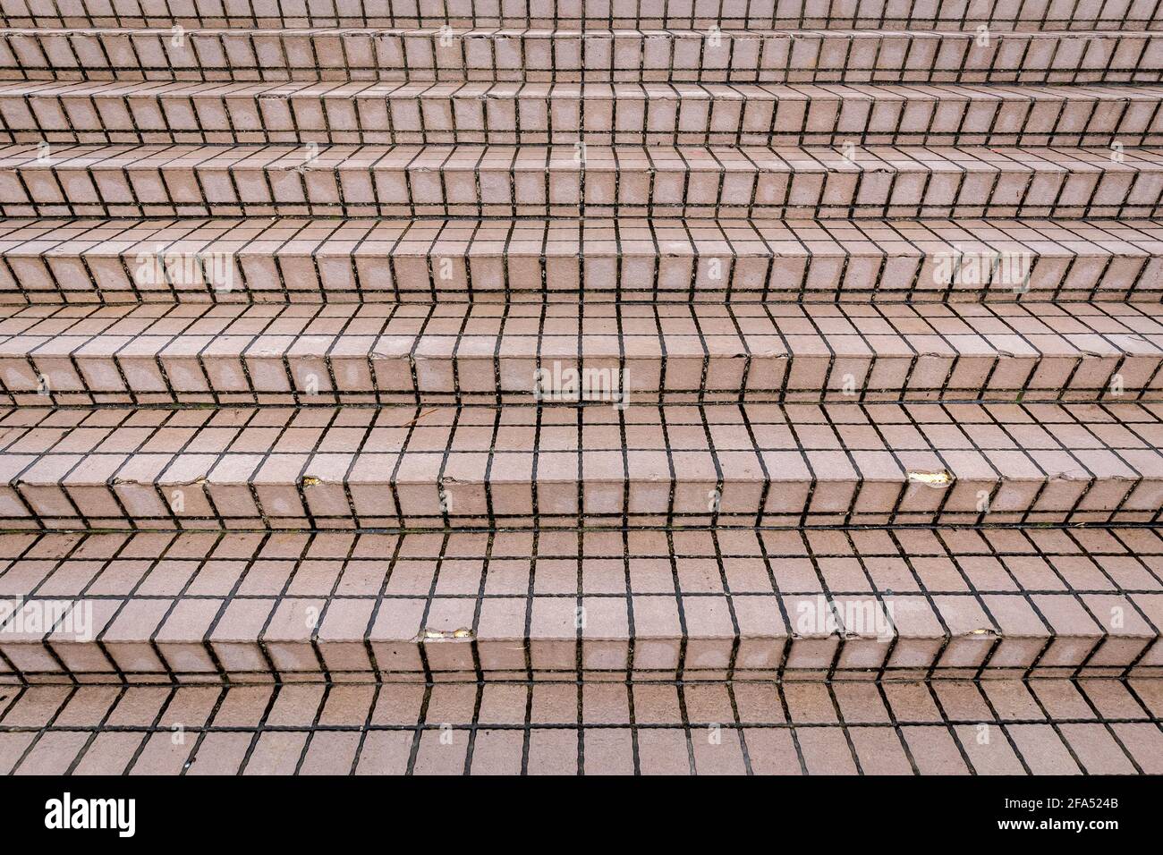 Orange tiles steps stairs textured background Stock Photo - Alamy