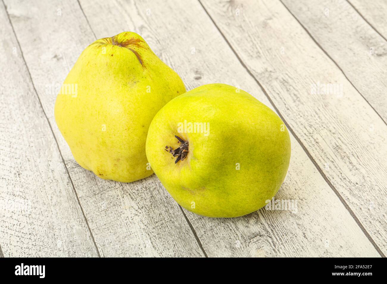 Sweet ripe and juicy quinces fruit Stock Photo - Alamy