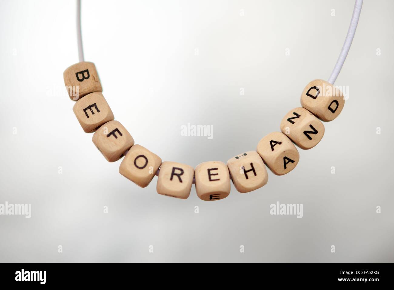Word accustom lined with wooden cubes Stock Photo - Alamy