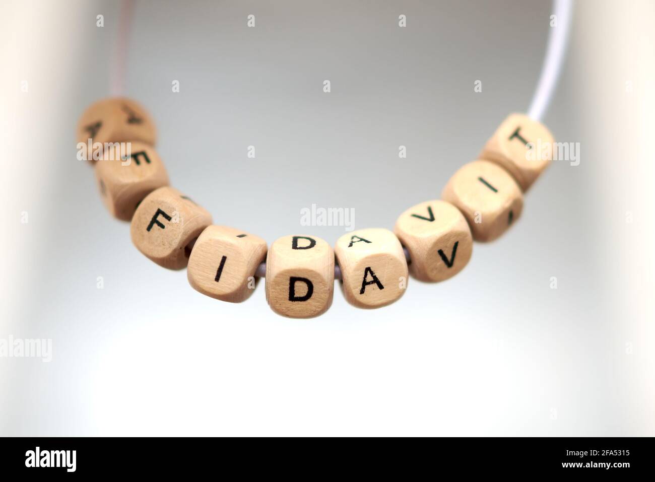 Word accustom lined with wooden cubes Stock Photo - Alamy