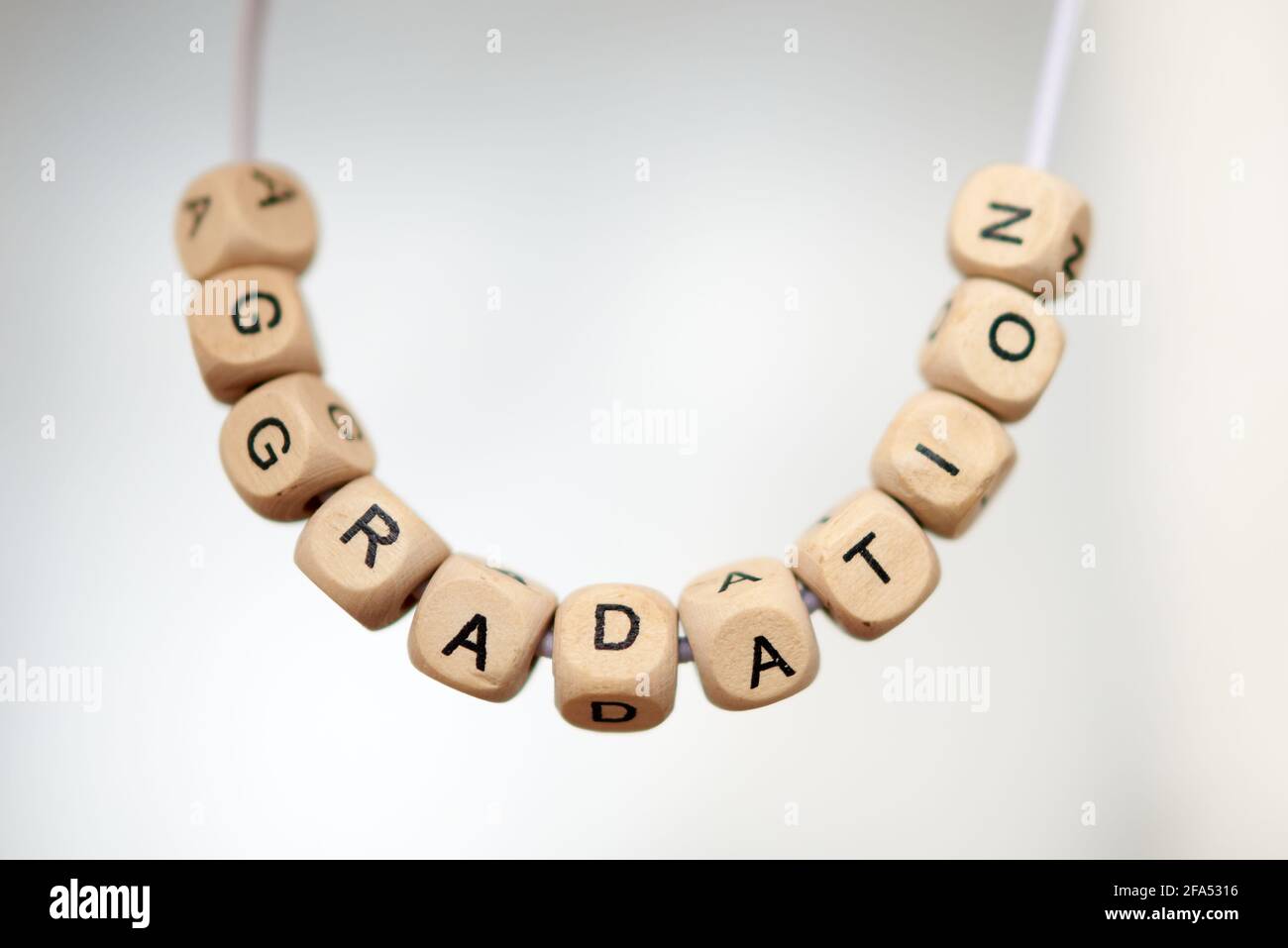 Word accustom lined with wooden cubes Stock Photo - Alamy