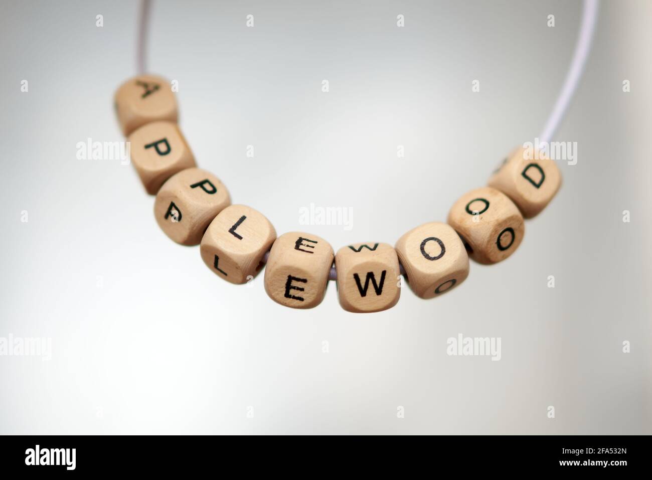 Word accustom lined with wooden cubes Stock Photo - Alamy