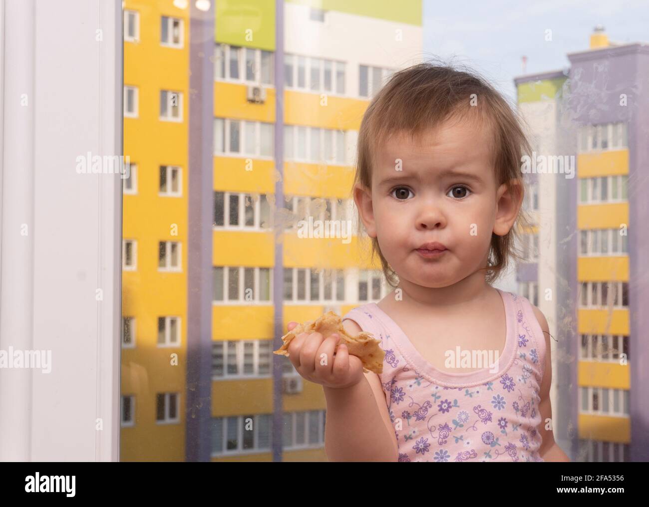 Confused facial expresion of little cute girl Stock Photo - Alamy