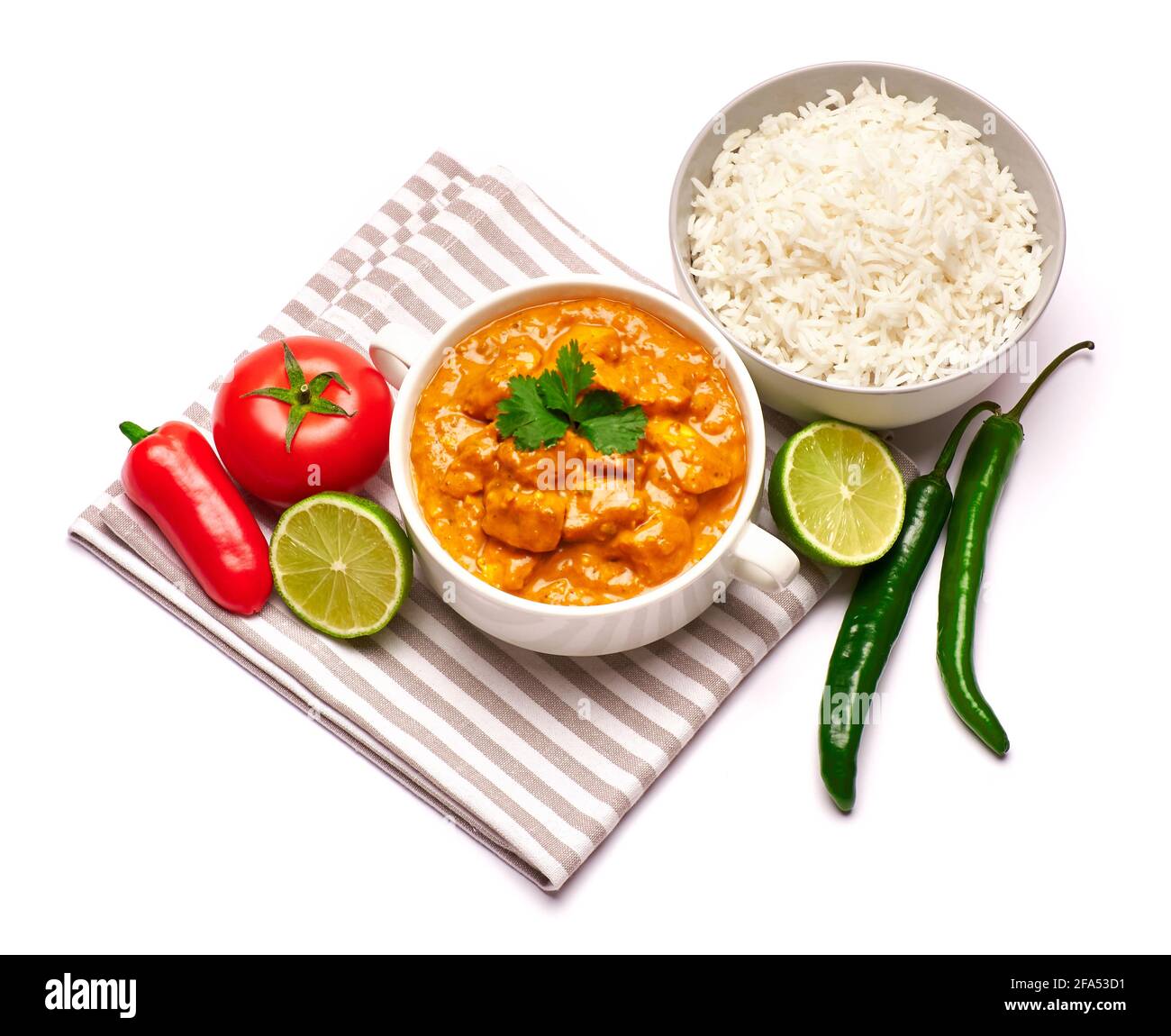 Traditional Chicken Curry and a bowl of boiled rice isolated on white ...