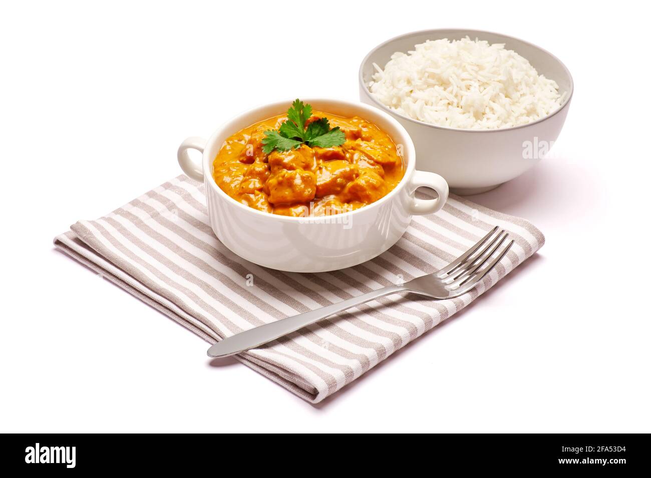 Traditional Chicken Curry and a bowl of boiled rice isolated on white ...