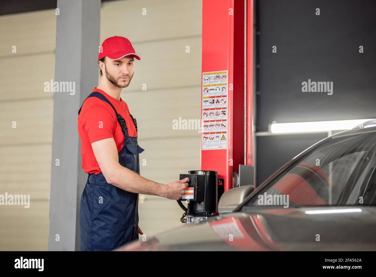 Male hand pressing button in hi-res stock photography and images - Alamy