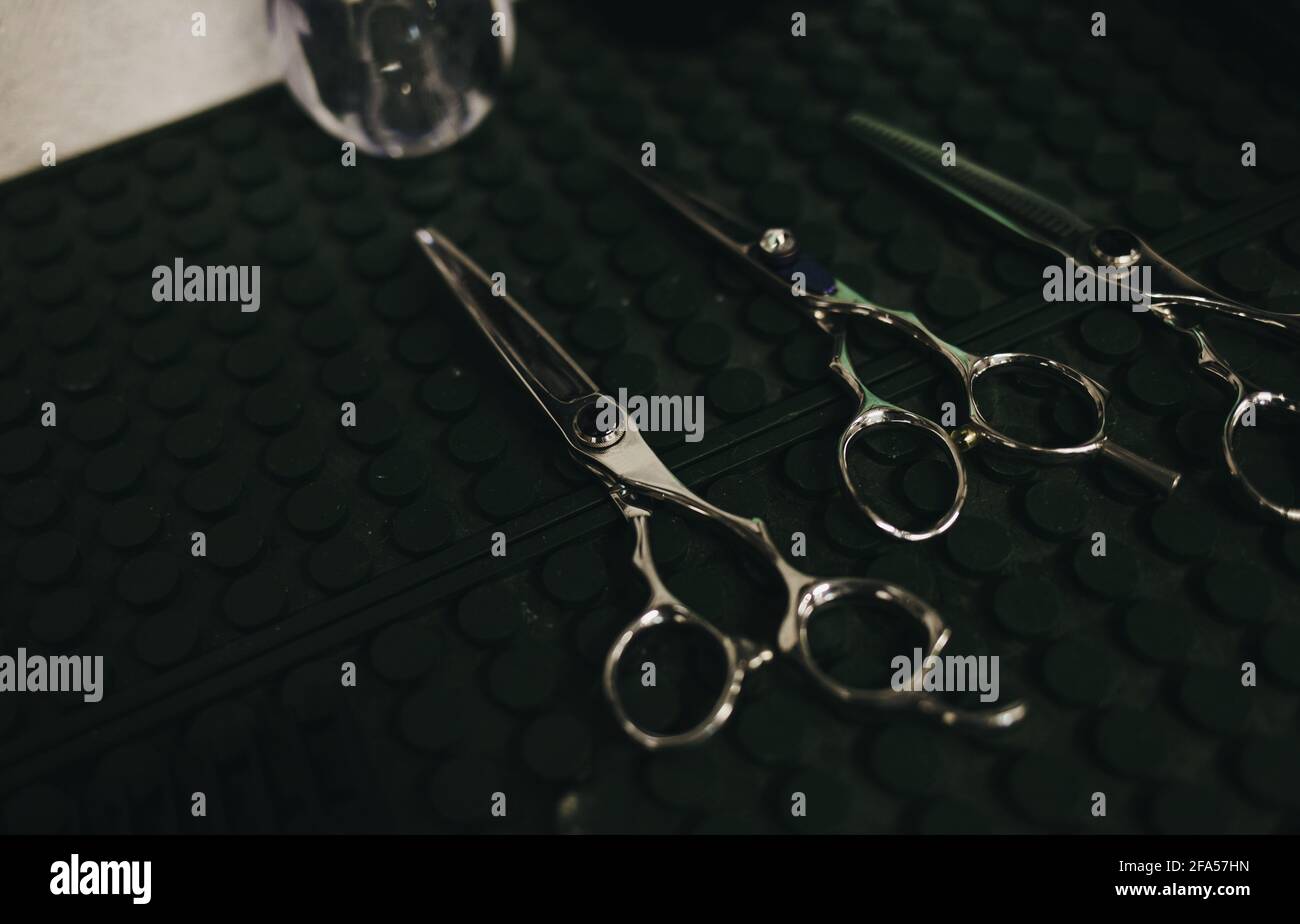 set of professional scissors for men's haircuts on the table Stock ...