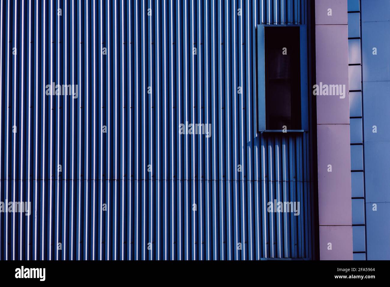 details of the aluminum facade of the building with a window and metal ...