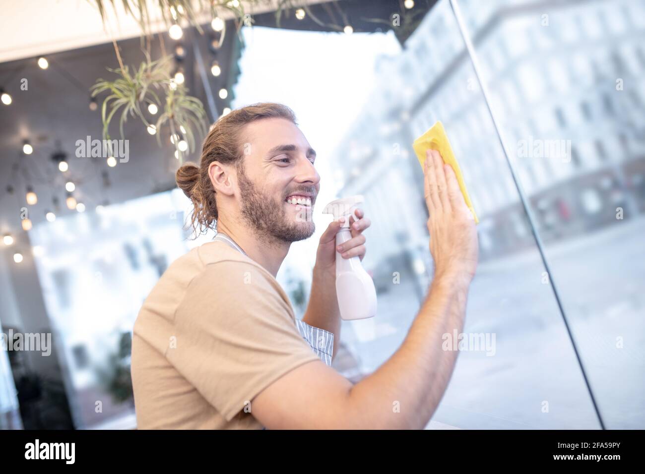 Wiping windows hi-res stock photography and images - Alamy