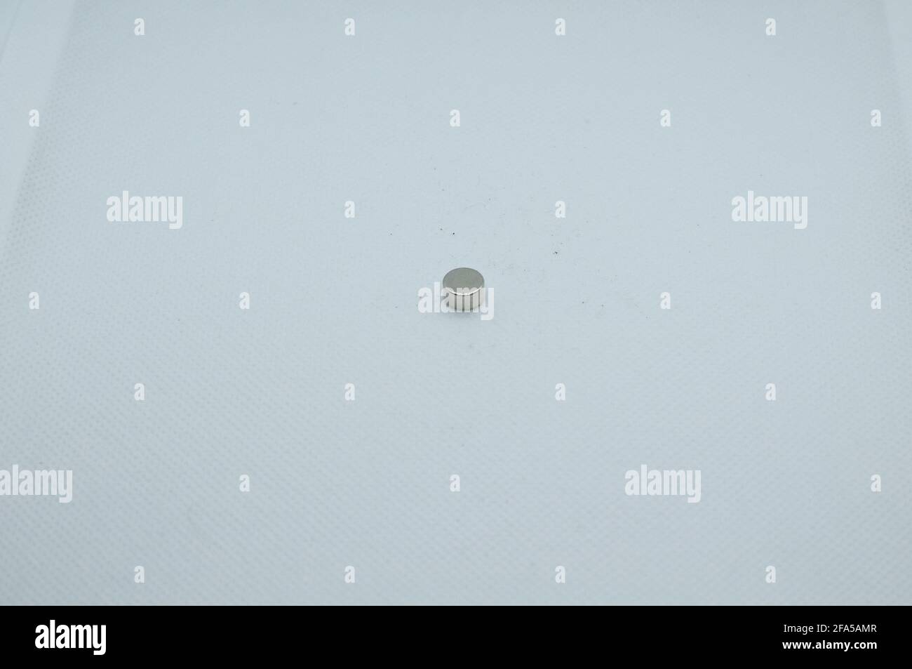 Single magnet on a white plain background Stock Photo - Alamy
