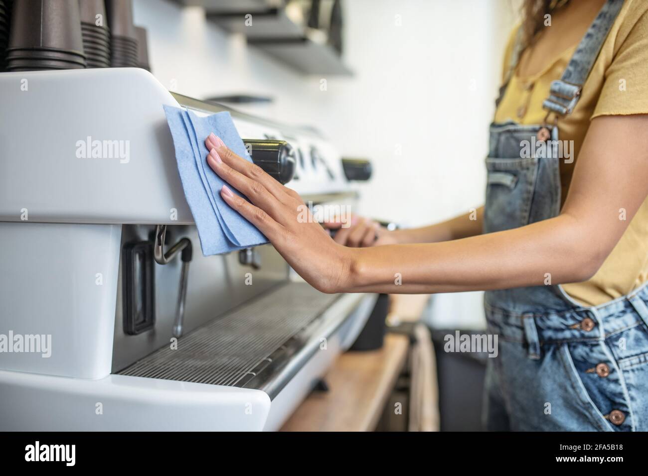 Female hands near control panel of coffee machine Stock Photo - Alamy