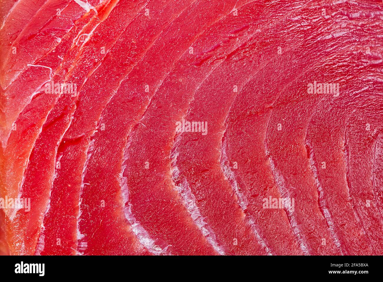 sliced bluefin tuna raw meat texture, close-up Stock Photo - Alamy