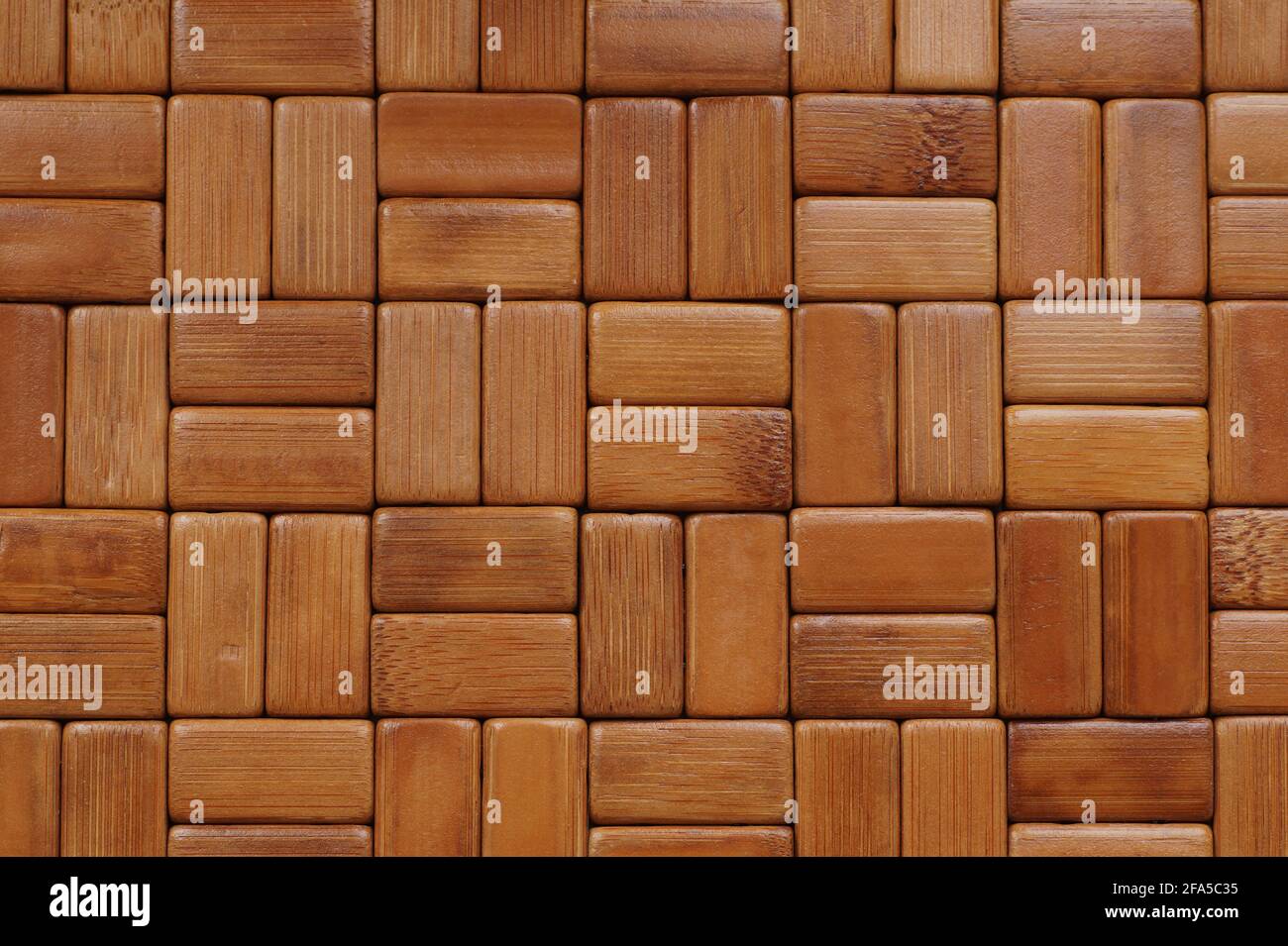 The mat is made of rectangular, sanded and varnished bamboo wood blocks ...