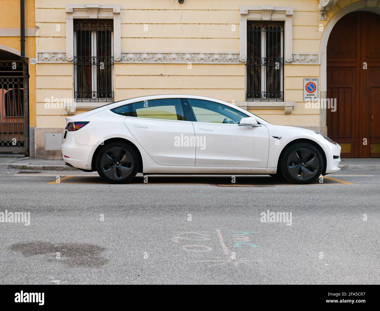 MILAN, ITALY - Apr 01, 2021: white Tesla 3 electric car parked in the ...