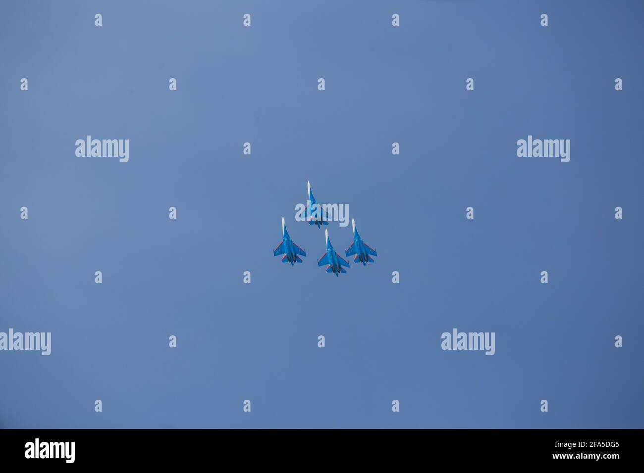 four jet planes are flying in a tight formation. dangerous aerobatics ...