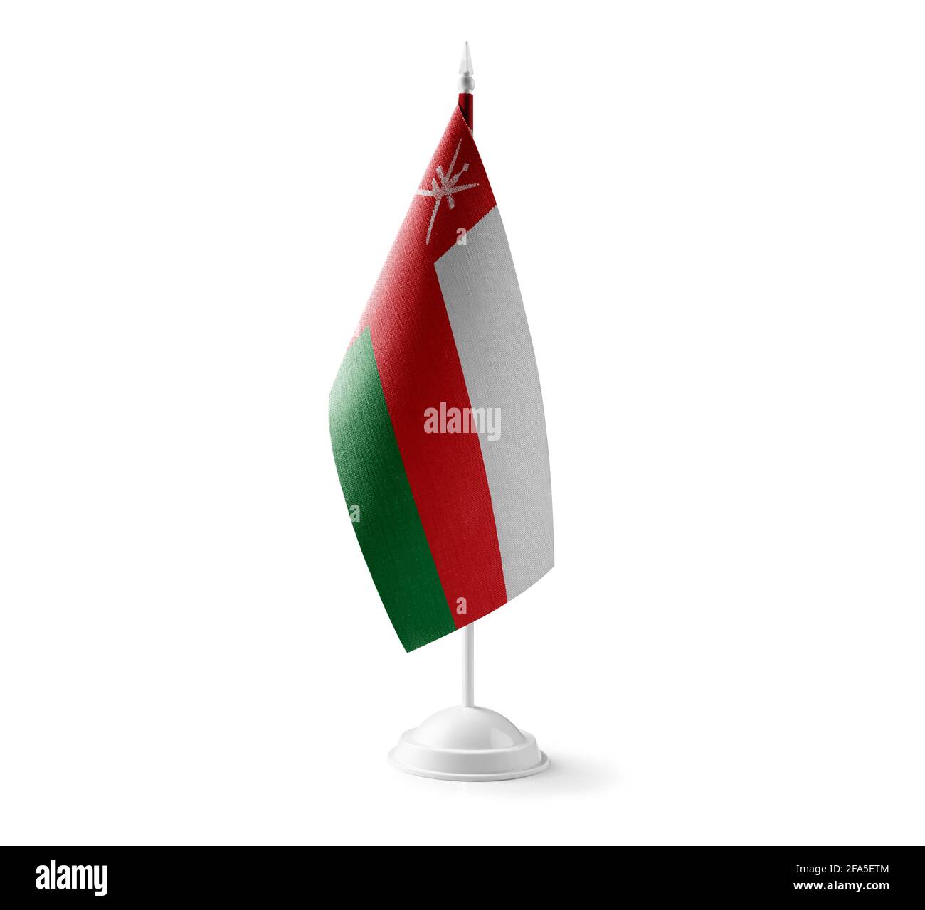 Small national flag of the Oman on a white background Stock Photo - Alamy