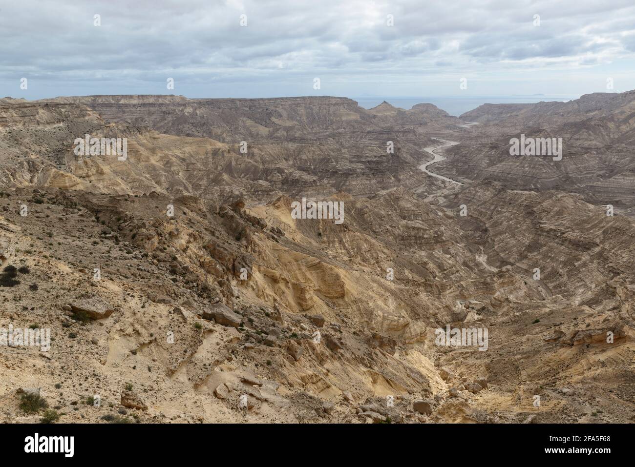 Impressive canyon leading to the sea. Dhofar Governorate, Oman Stock ...