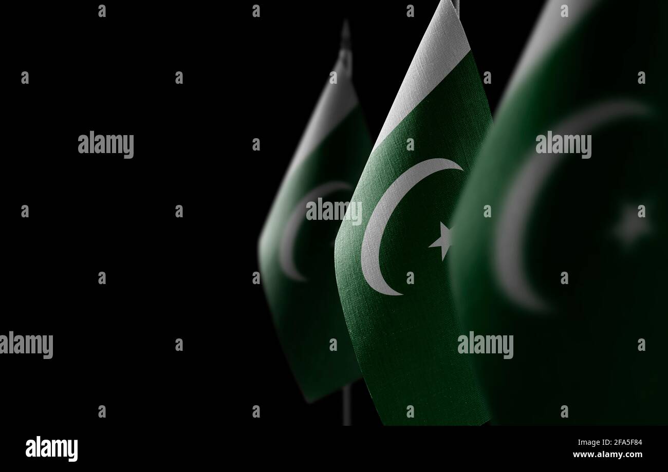 Small national flags of the Pakistan on a black background Stock Photo ...