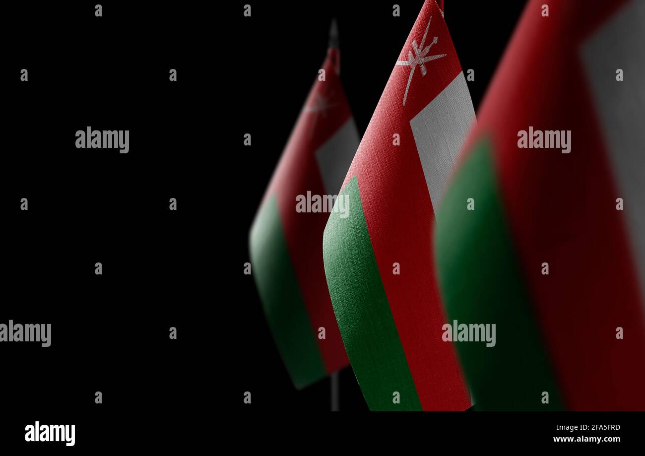Small national flags of the Oman on a black background Stock Photo - Alamy