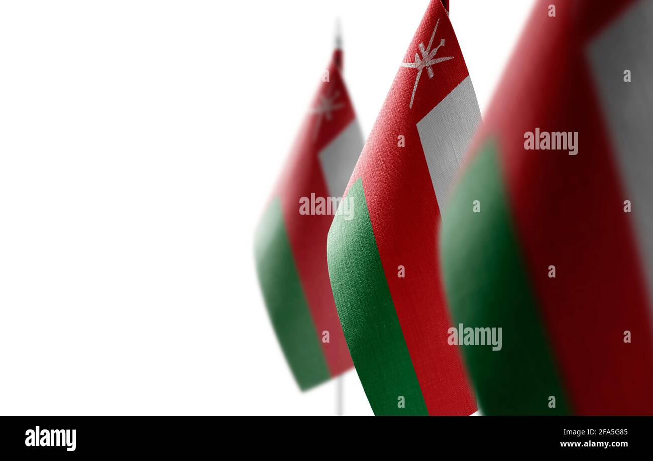 Small national flags of the Oman on a white background Stock Photo - Alamy