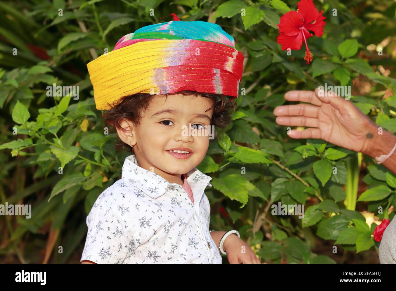 close-up portrait of A child with a beautiful and attractive smiling ...