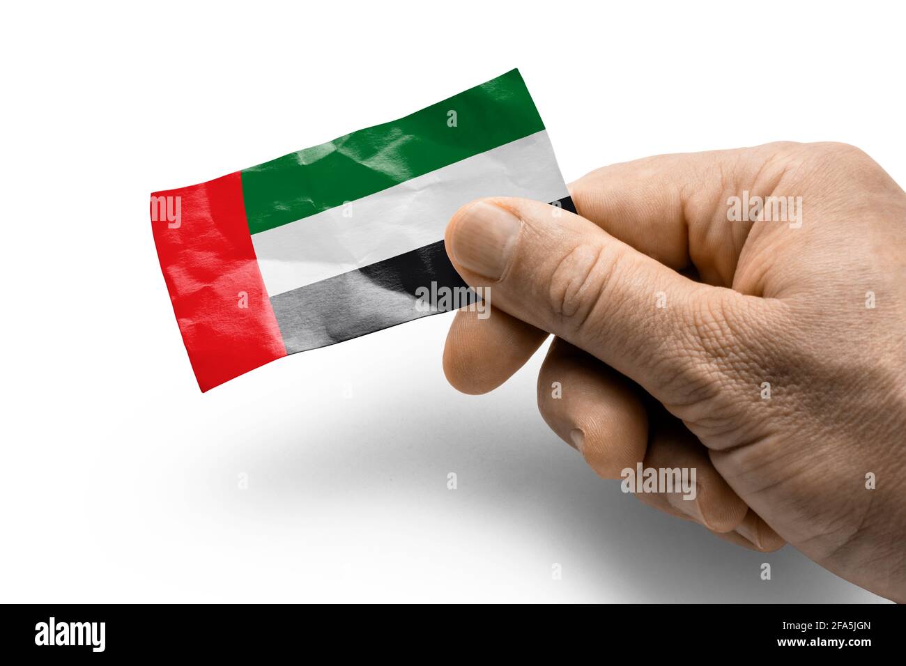 Uae flag hand hi-res stock photography and images - Alamy