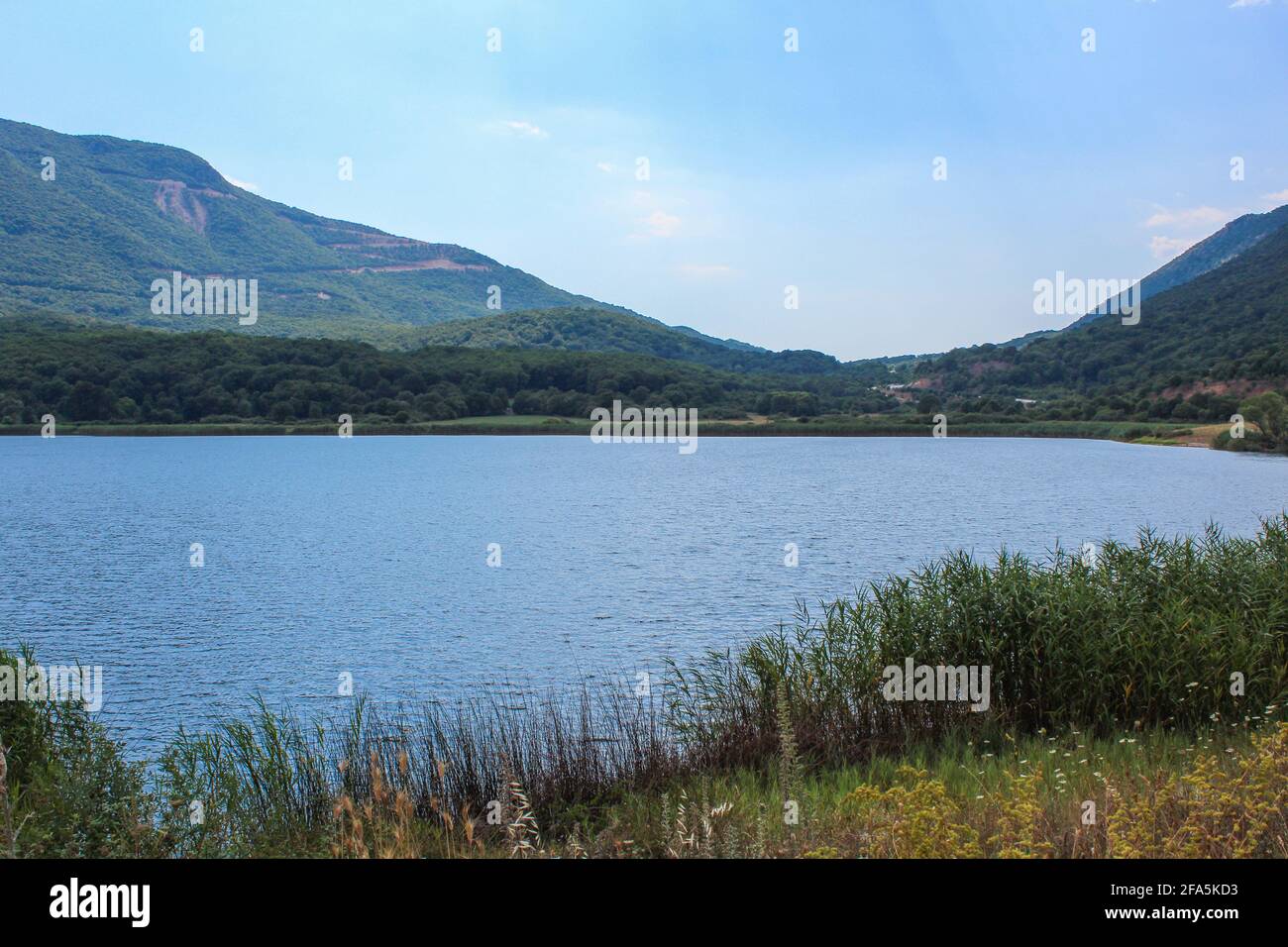 Stunning greek sea, lake landscape Stock Photo - Alamy