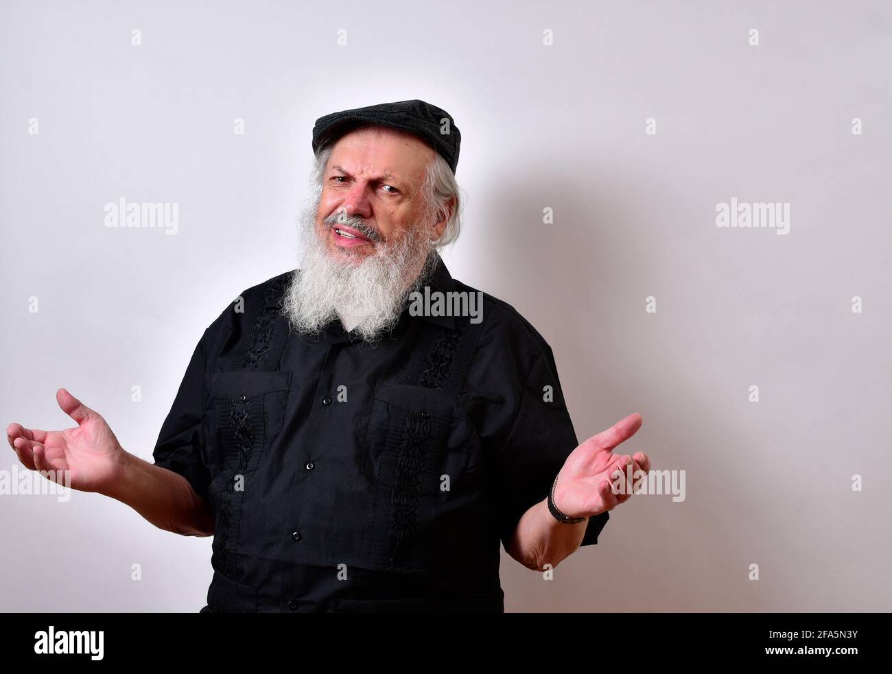 Grumpy senior man with a confused and angry face Stock Photo - Alamy