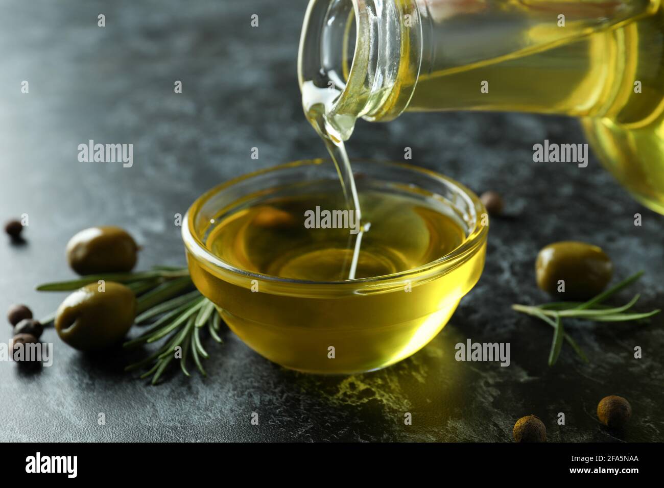 Oil pouring from bottle hi-res stock photography and images - Alamy