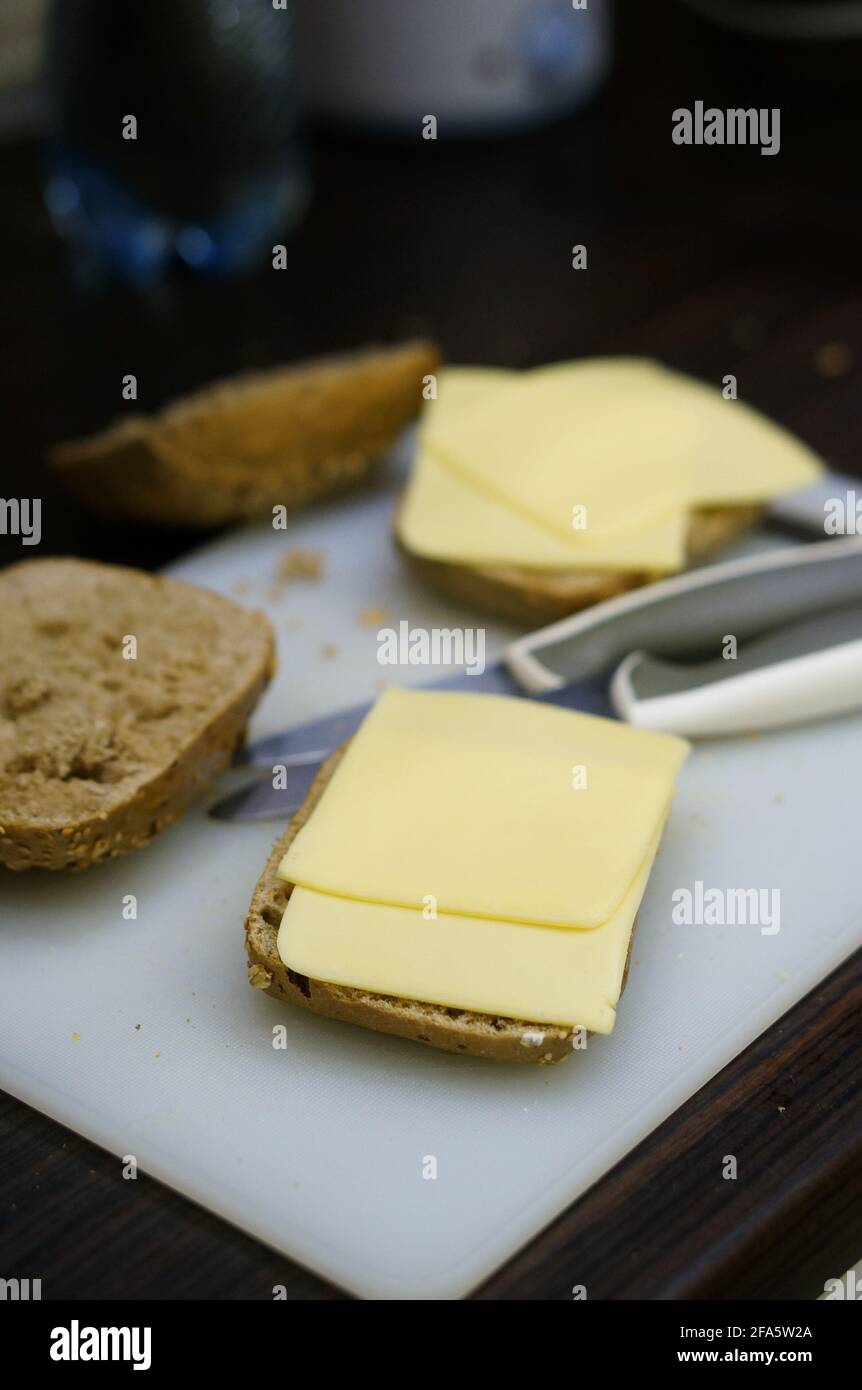 Bread and cheese on a table Stock Photo - Alamy