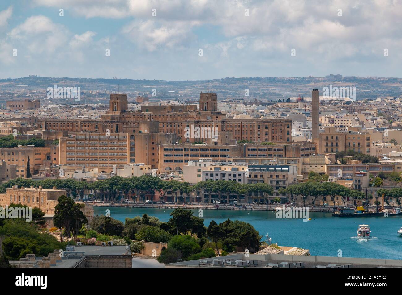 A picture of St. Luke's Hospital as seen from Valletta Stock Photo - Alamy