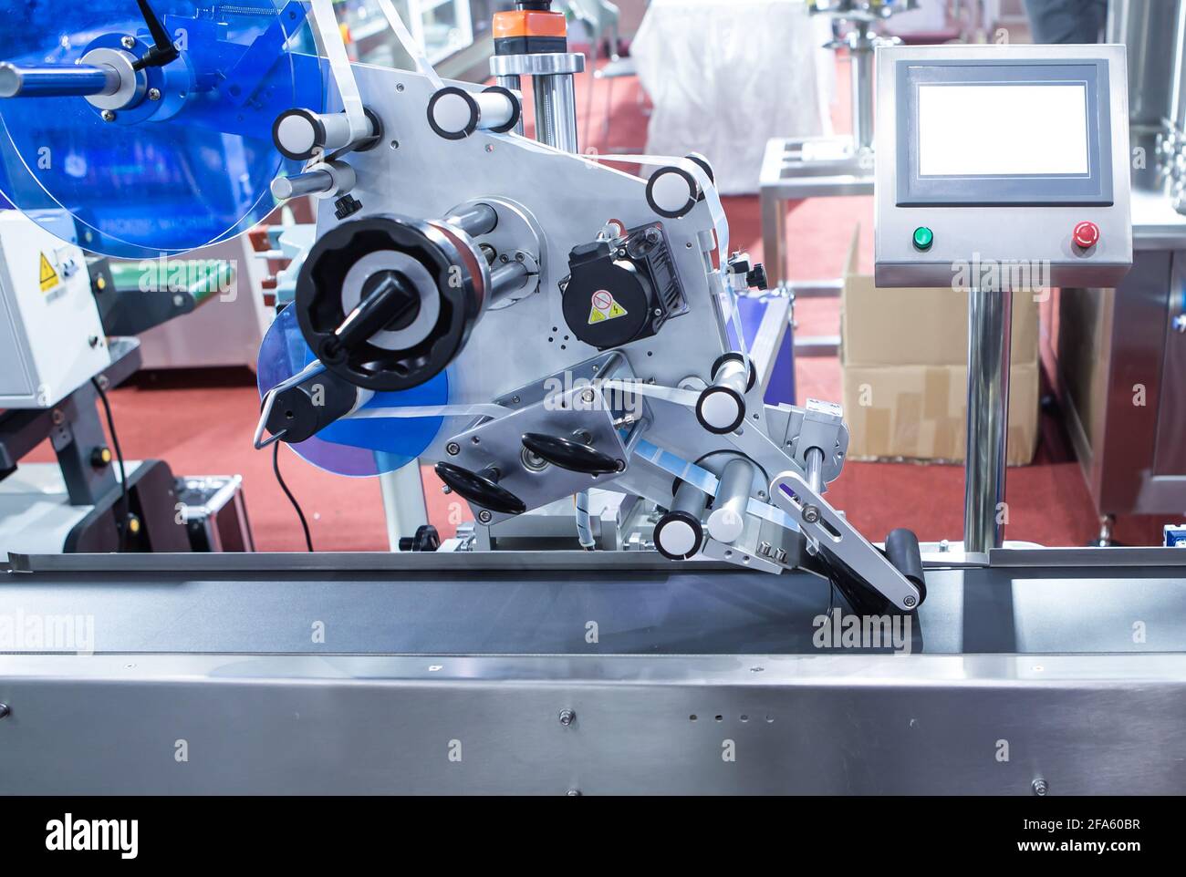 Automatic plastic bag sticker labelling machine. Packaging Label logo ...