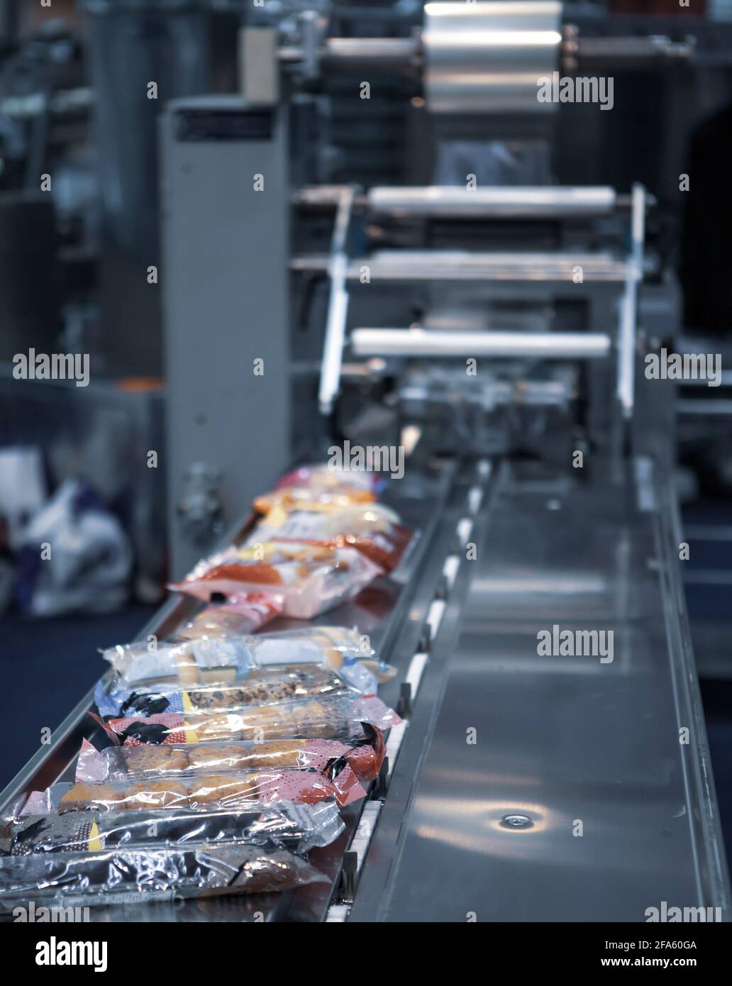 Automatic packing of bakery product flow pillow packing machine. Bread ...