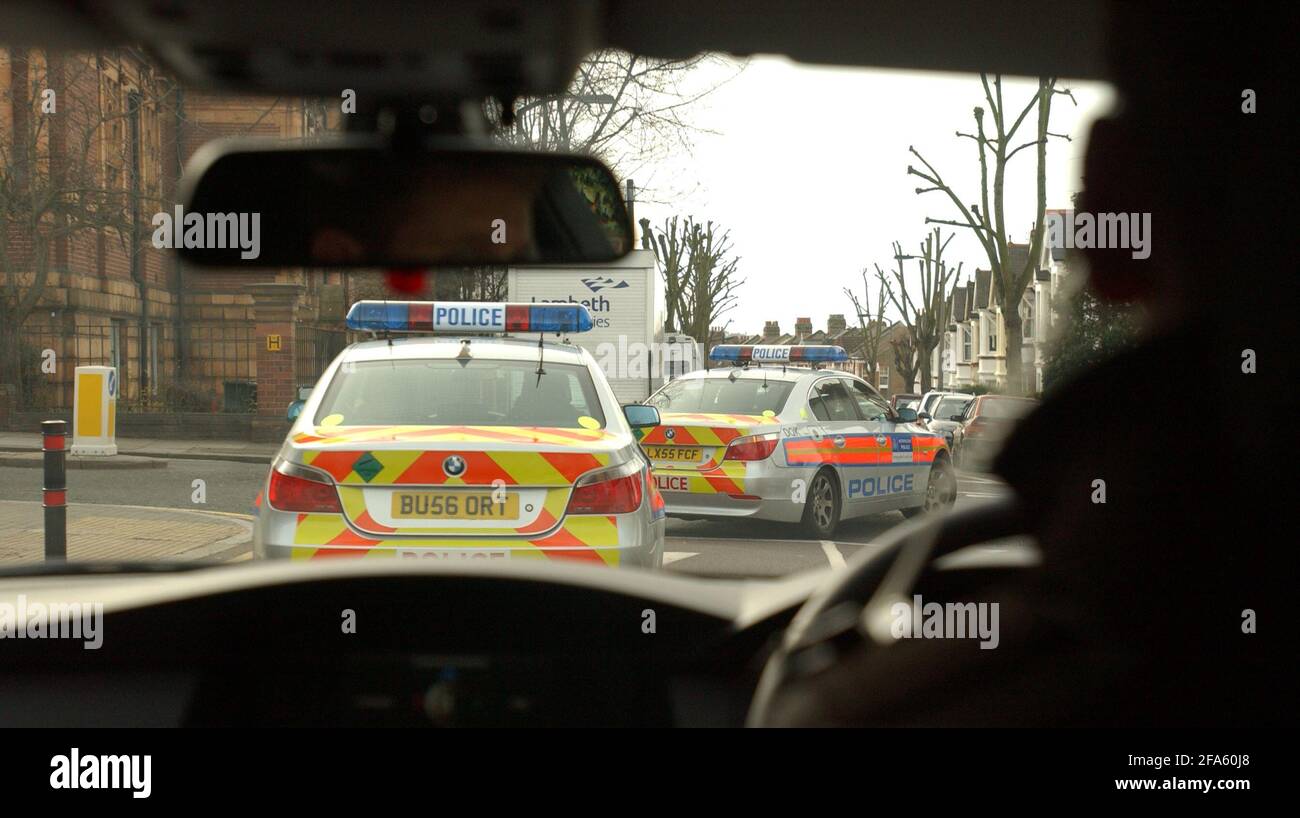 ARV POLICE EN ROUTE TO SEARCH A SUSPECT AT A PETROL STATION NR BRIXTON ...