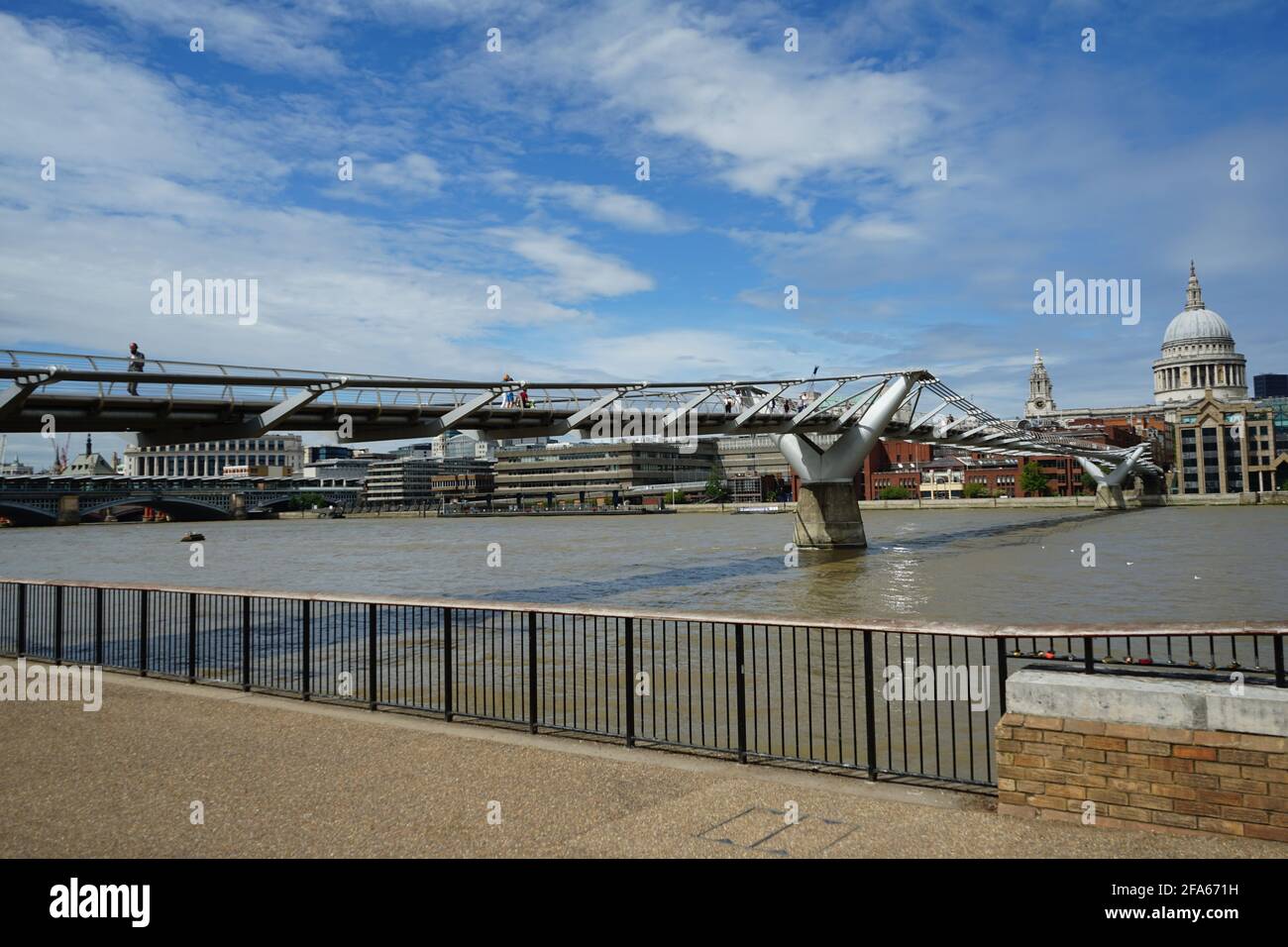 The Millennium bridge crossing the thames in London, England, U.K Stock Photo - Alamy