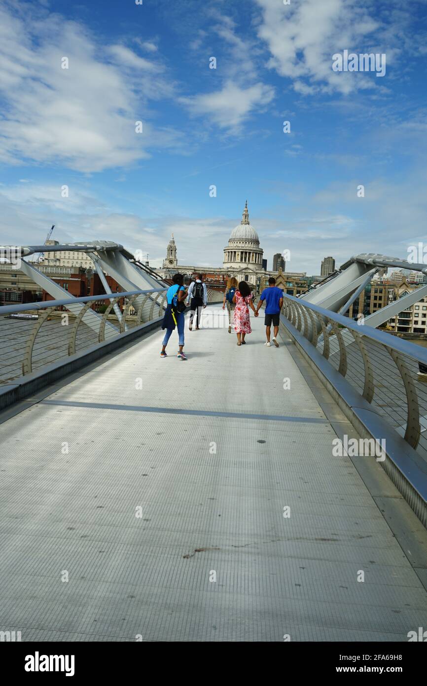 Walking the millennium bridge in London England, U.K Stock Photo - Alamy