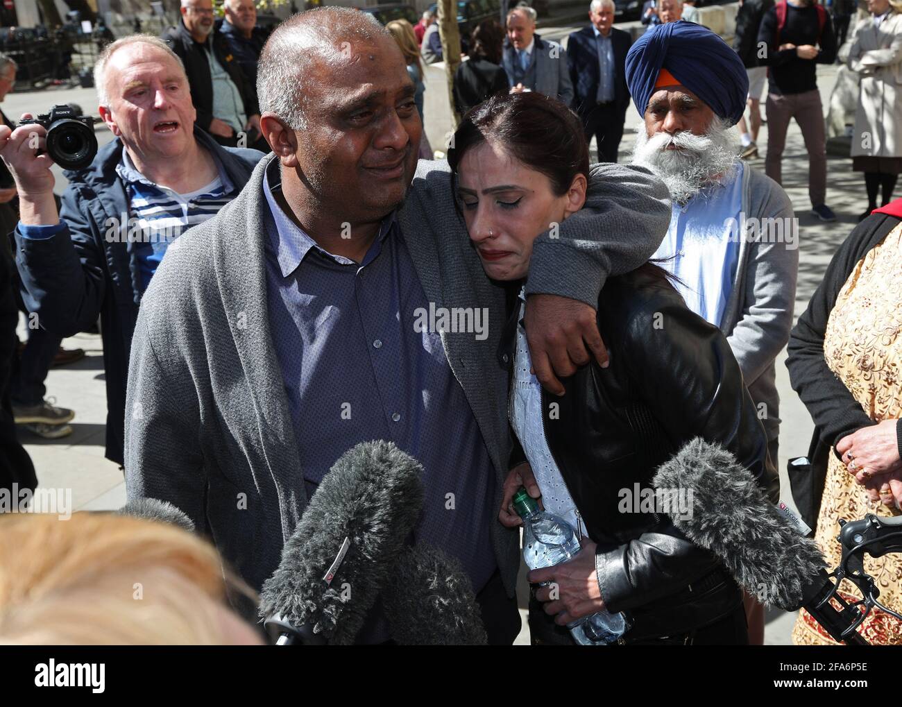Postmaster Harjinder Butoy (left)outside the Royal Courts of Justice ...