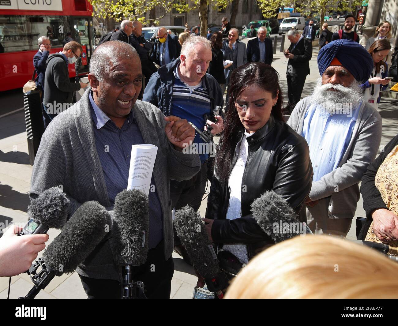 Postmaster Harjinder Butoy (left)speaking to media outside the Royal ...