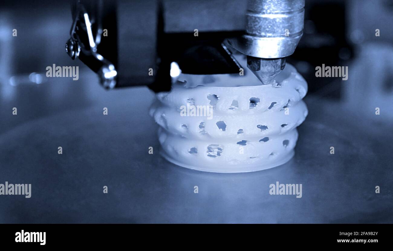 3d printer printing objects blue gray color form closeup Stock Photo ...