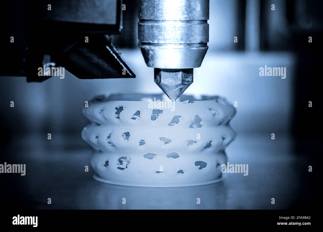 3d printer printing objects blue gray color form closeup Stock Photo ...