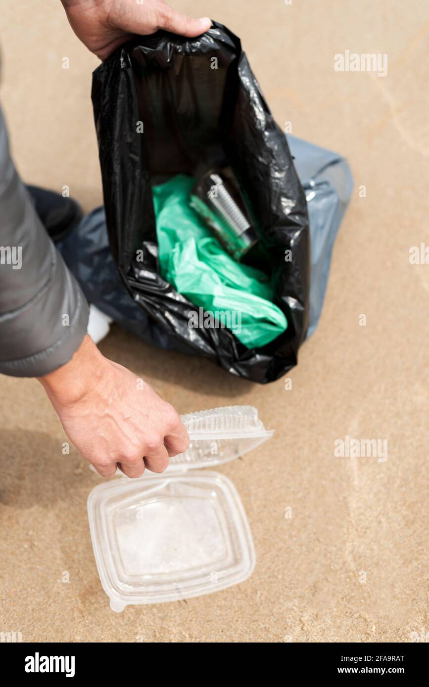 Man removing waste hi-res stock photography and images - Alamy
