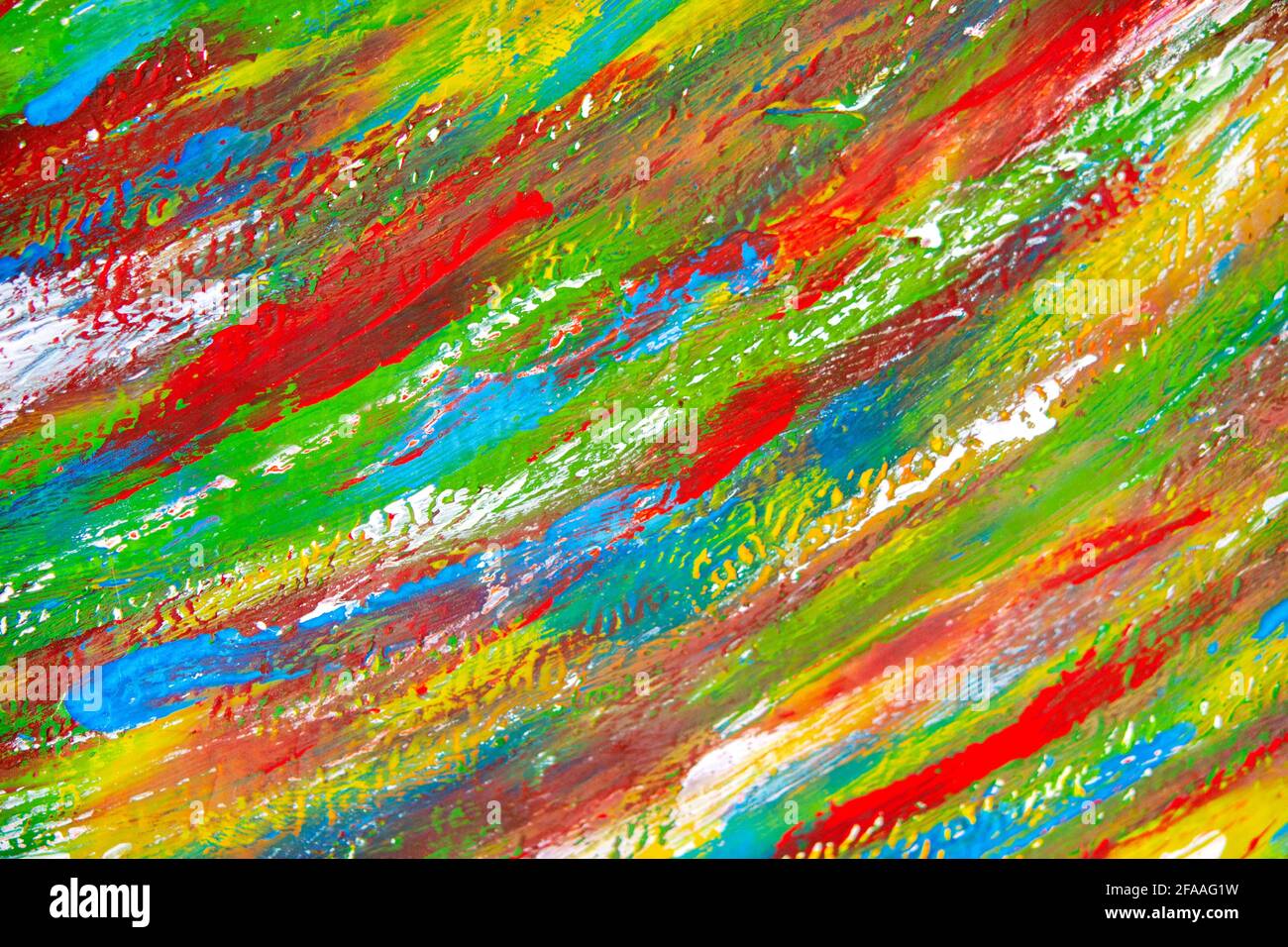 Many different multi-colored lines are chaotically drawn with brush ...